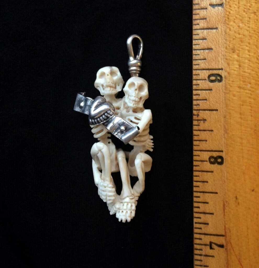 Geoclassics | Fossil Ivory Skeleton Soul Mates Pendant