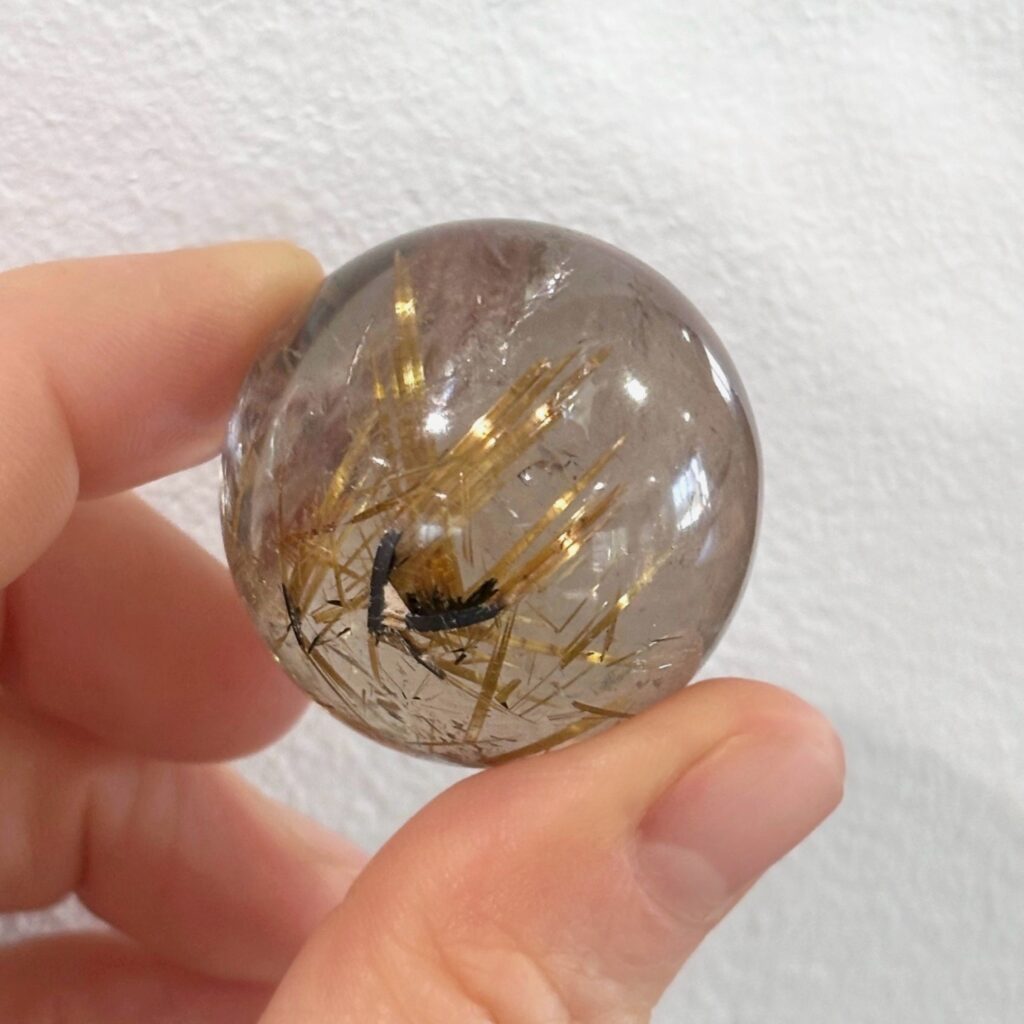 Geoclassics | Rutilated Quartz Sphere with Hematite Inclusions