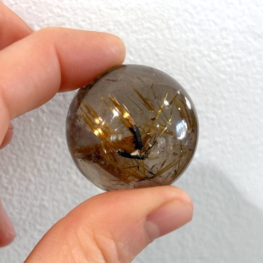 Geoclassics | Rutilated Quartz Sphere with Hematite Inclusions