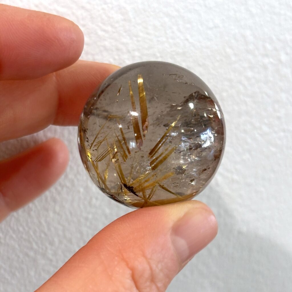 Geoclassics | Rutilated Quartz Sphere with Hematite Inclusions